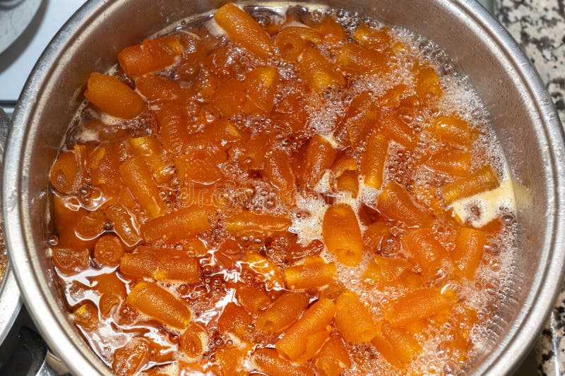 Citrus Jam Cooked in a Saucepan. Jam Boiling on the Fire Stock Photo ...