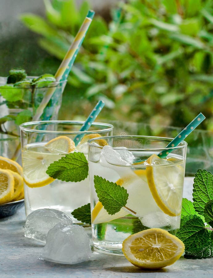 Citrus Lemonade with Mint and Ice Stock Photo - Image of drink, cube ...