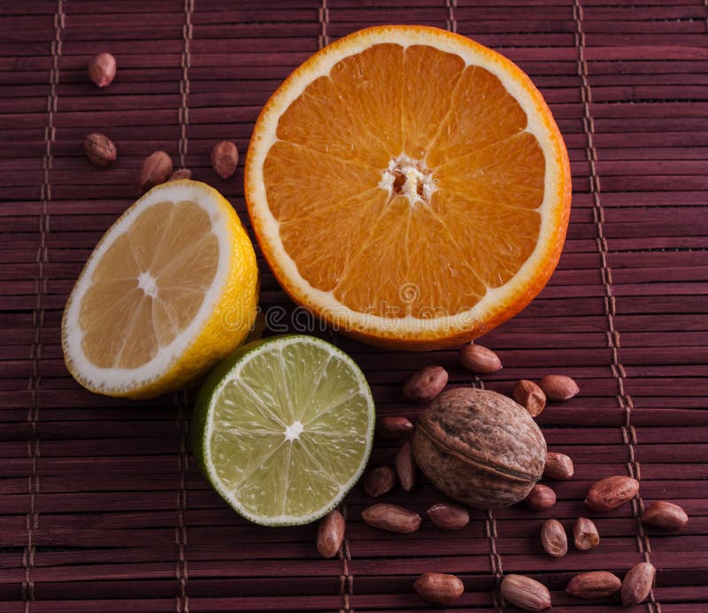 Citrus and nuts stock photo. Image of napkin, sweet - 137658656