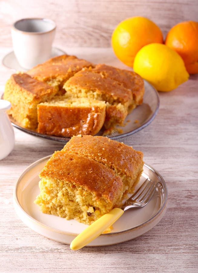 Citrus poke cake, sliced stock image. Image of homemade - 257949439