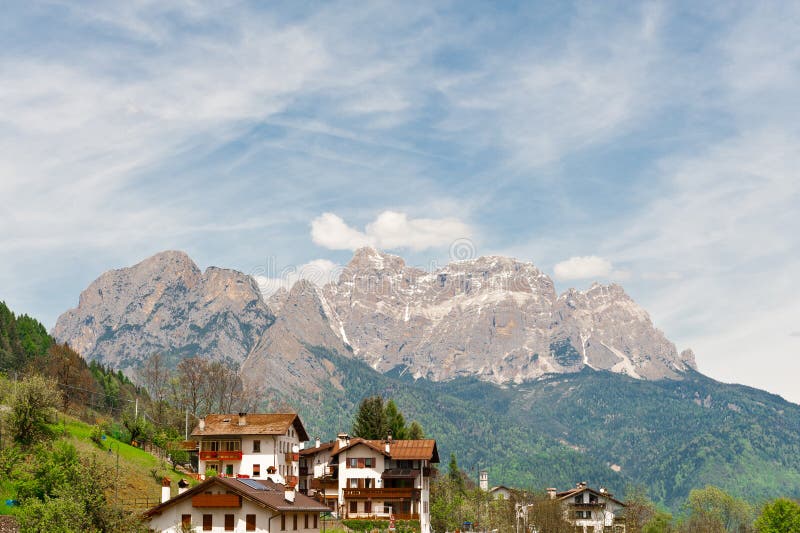 City in Alps stock photo. Image of mountain, alps, pasture - 87654732