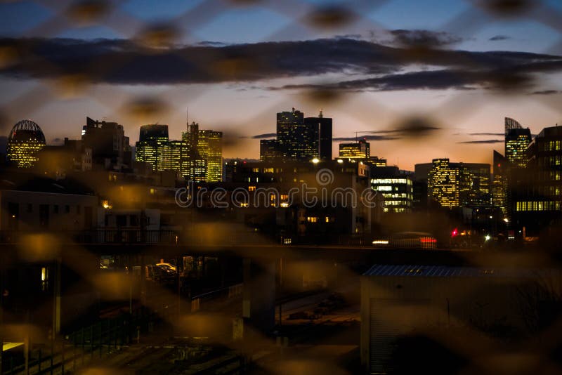 The City Behind the Grid at Night Stock Image - Image of fence ...