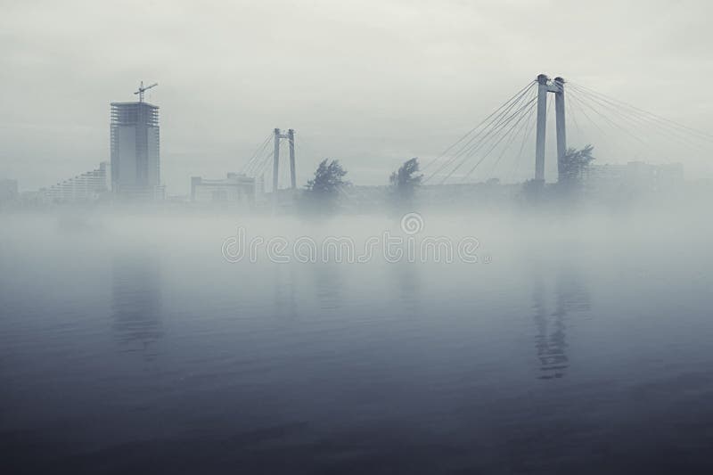 City and bridge in fog stock photo. Image of cityscape - 18215054