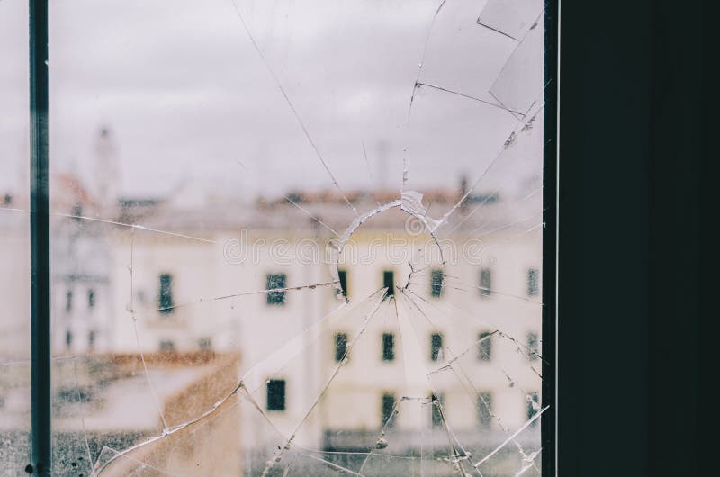 City from Broken Window stock image. Image of frame - 116325205