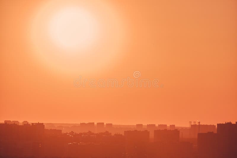 City Buildings Against an Orange Sunset Sky, Copy Space Stock Photo ...