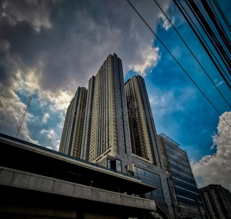 City buildings and sky editorial photography. Image of cloud - 197110157