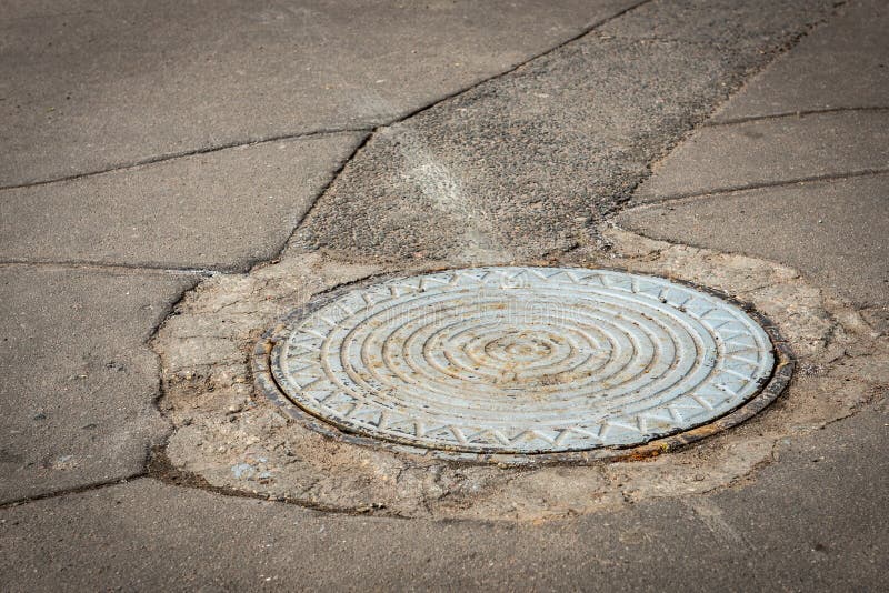 City Canal Hatch/cover on the Asphalt Road Stock Photo - Image of sewer ...