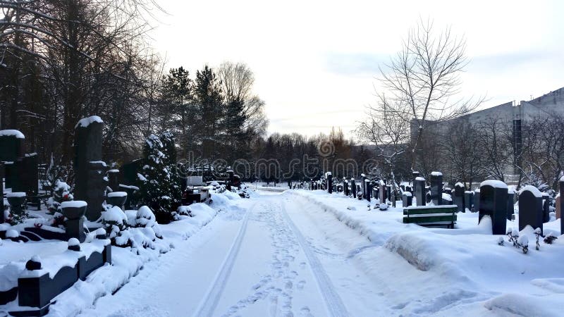 City cemetery in the snow stock image. Image of tomb - 83650889