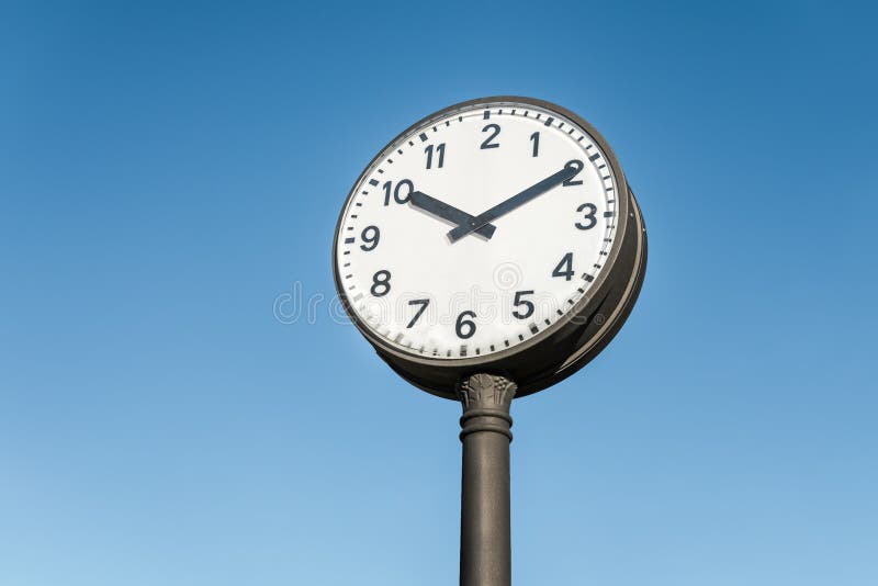 City Clock Isolated on Blue Sky Background Stock Photo - Image of time ...