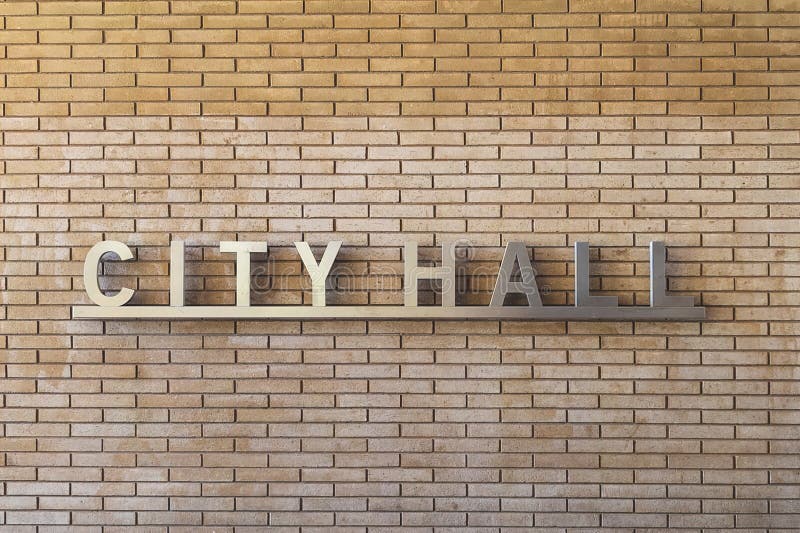 A City Hall Sign on a Brick Wall Stock Photo - Image of classic, zone ...