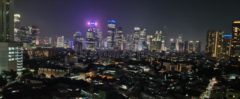 City Life at Midnight stock photo. Image of night, skyscraper - 258025076