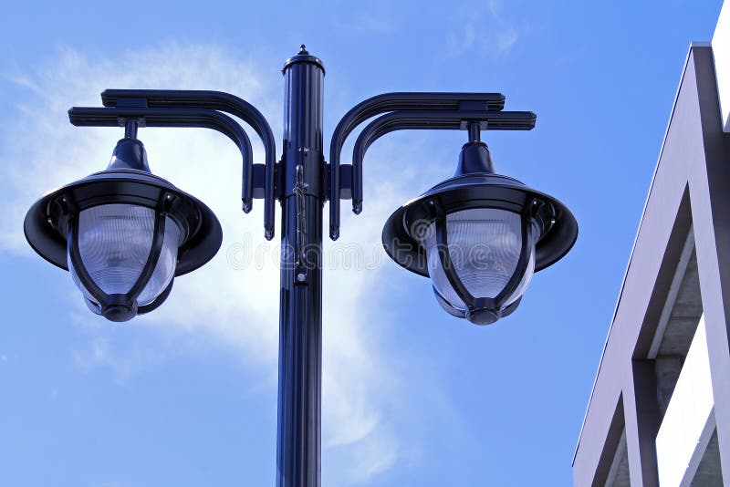 City Light Post with Two Hanging Street Lights Stock Photo - Image of ...