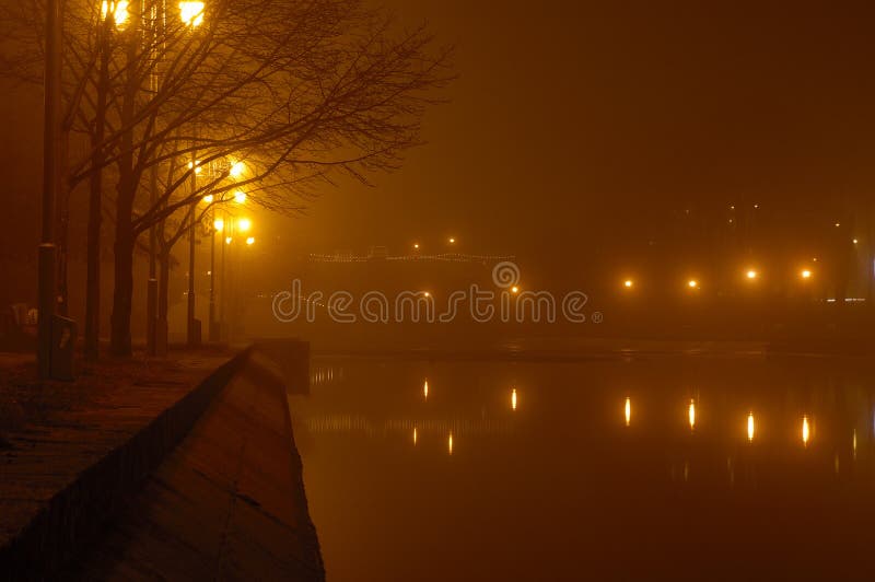City Lights on a Foggy Night Stock Image - Image of spooky, winter: 1269287