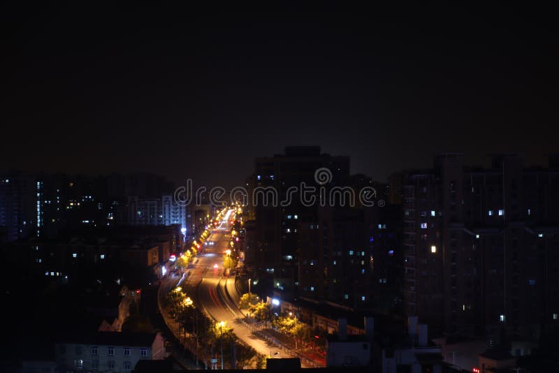 City in midnight stock image. Image of carlight, city - 162887171