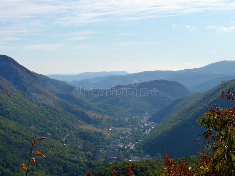 City in the Mountainous Valley Stock Image - Image of city, cloud ...