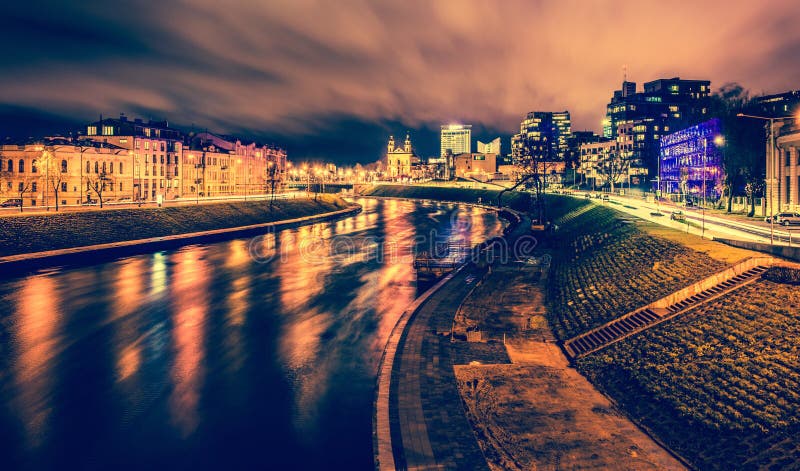 City at Night with River Reflections Stock Image - Image of neris ...