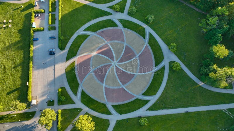 A City Park Covered with Trees and Grass, with Paths for Walking, in ...