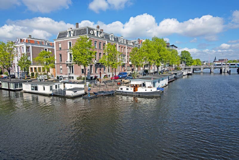 City Scenic from Amsterdam at the River Amstel in Netherlands Stock ...