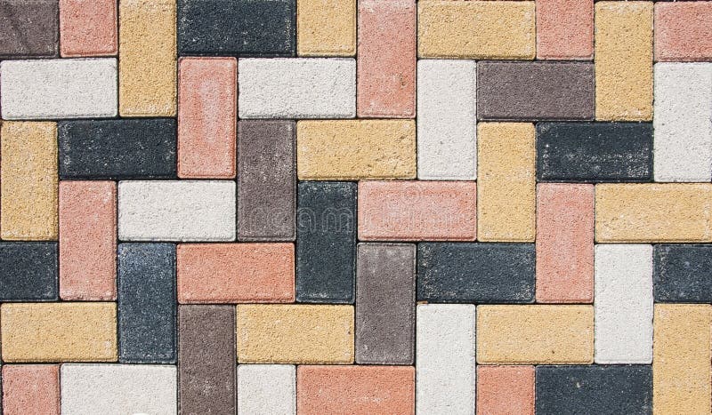 The City Sidewalk is Lined with Multi-colored Road Tiles. View from ...