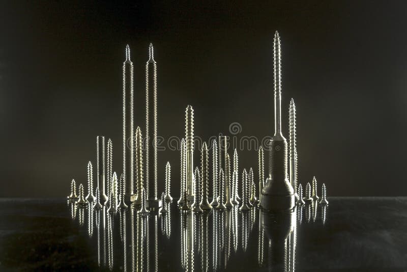 City Skyline Made of Bolts and Screws Stock Image - Image of screws ...