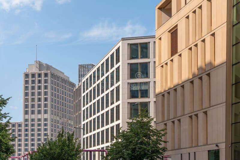 A City Skyline with a Tall Building in the Background Stock Image ...