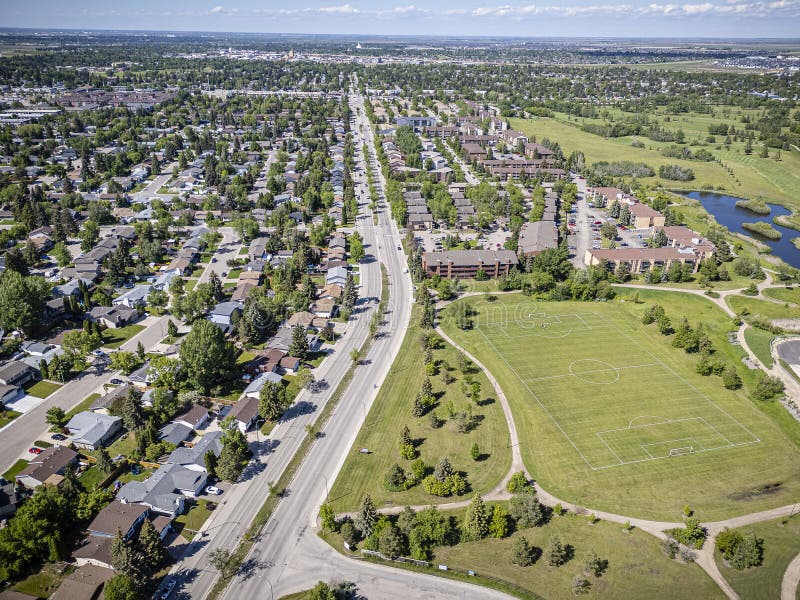 City Street with a Park in the Background Stock Photo - Image of garden ...