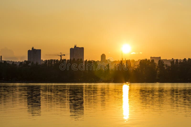 City at sunset stock image. Image of modern, river, beautiful - 152369453