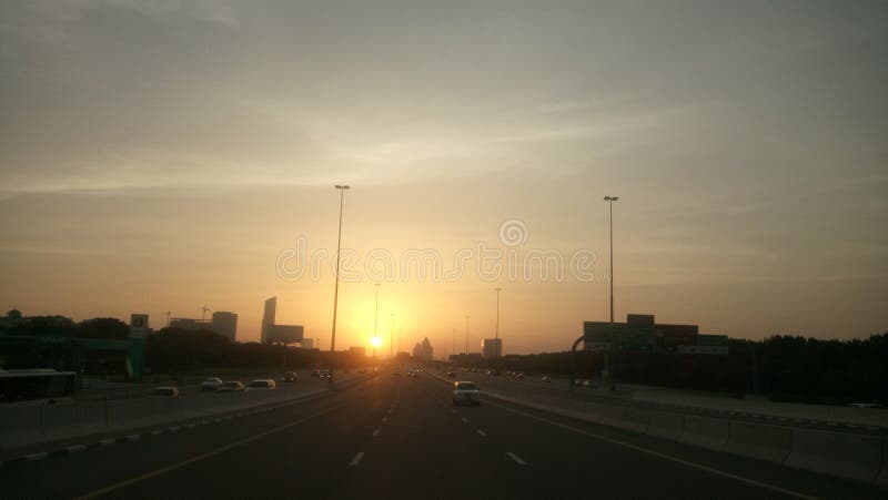 City sunset stock image. Image of city, sunset, road - 93749569