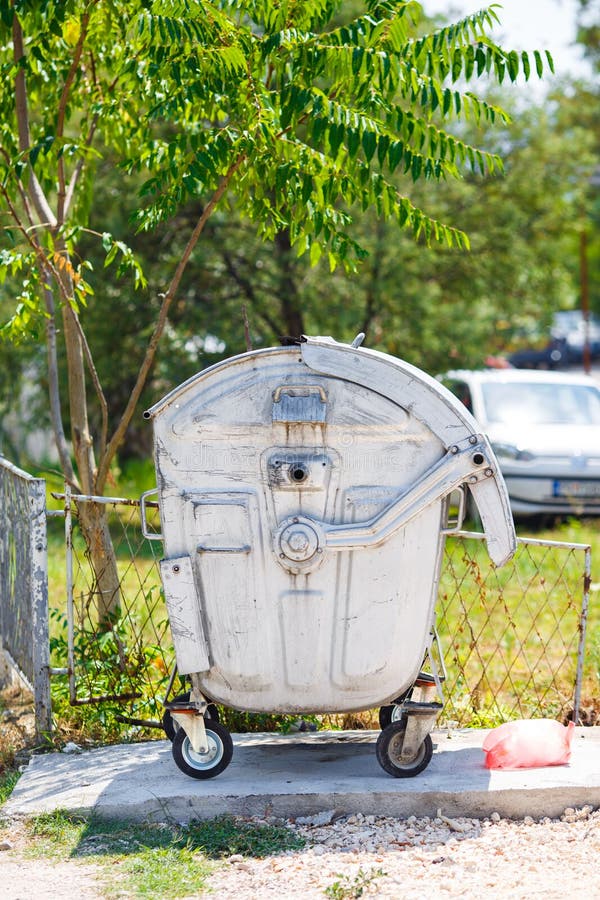 City Trash Can Made of Metal on a Summer Day. Stock Image - Image of ...