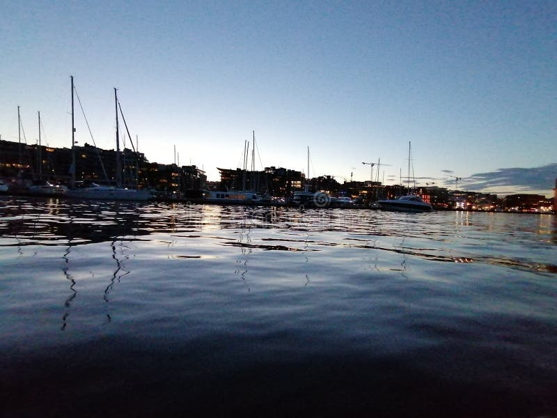 City View at Night from the Sea Stock Photo - Image of horizon, boat ...