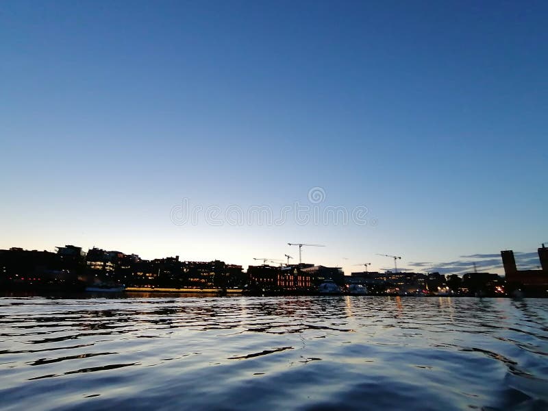 City View at Night from the Sea Stock Photo - Image of water, morning ...