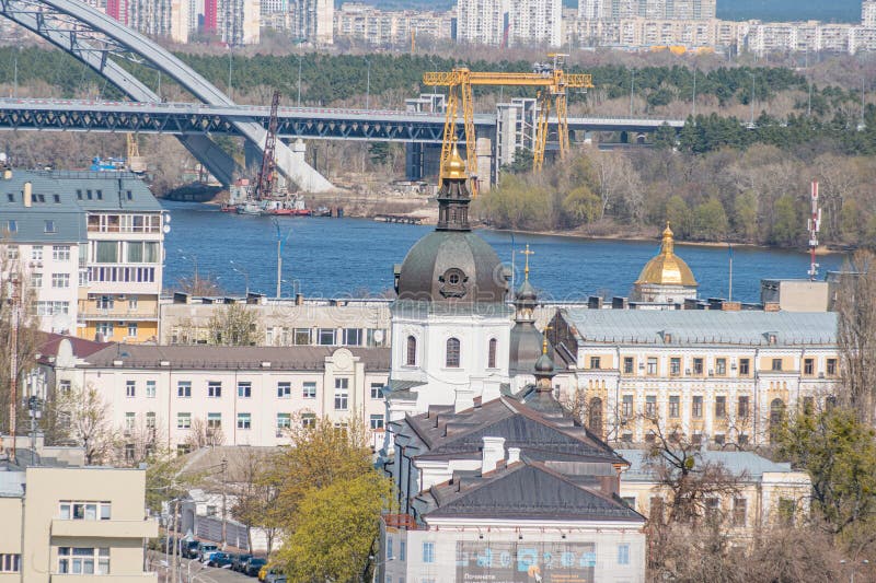 Cityscape from Elevated Viewpoint, by Navigable River with Bridge in ...