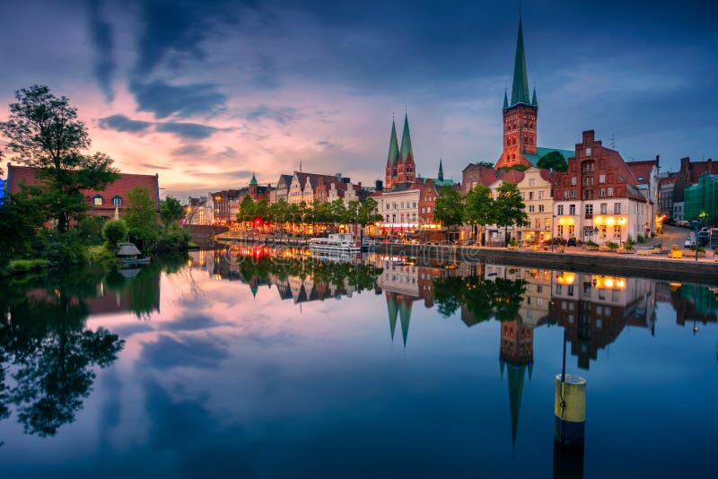 Lubeck, Germany at sunset. stock photo. Image of dusk - 251104366