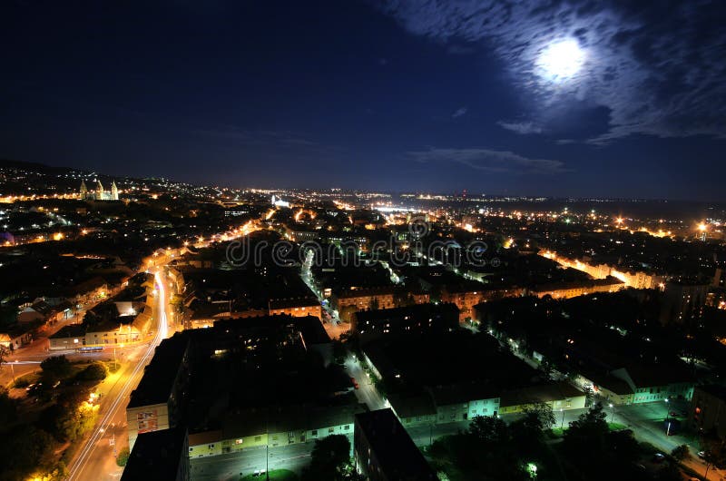 Cityscape at moonlight stock photo. Image of district - 3631318