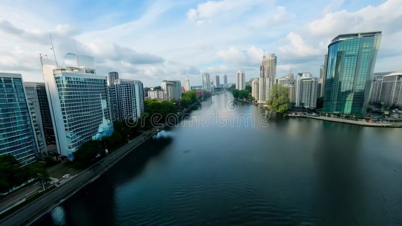 Cityscape Reflected in Fast-moving Water, Creating a Blurred, Abstract ...