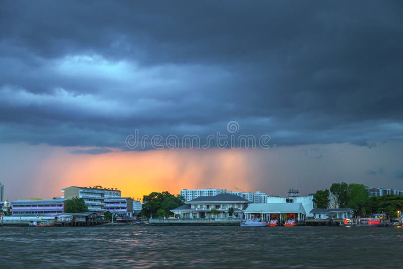 Cityscape River View with Black Rain Clouds before Rain is Coming Over ...