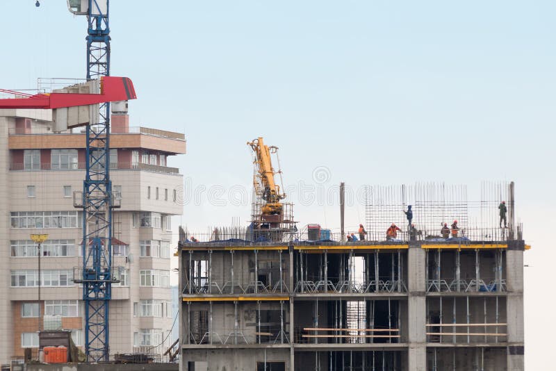 Cityscape with Workers and Incomplete Building at Stock Photo - Image ...