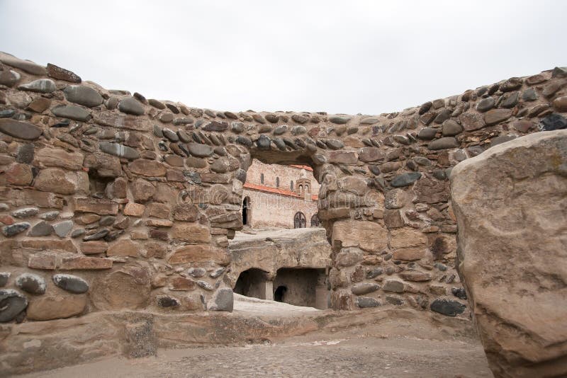 Ciudad Roca-cortada Antigua De Uplistsikhe Foto de archivo - Imagen de ...