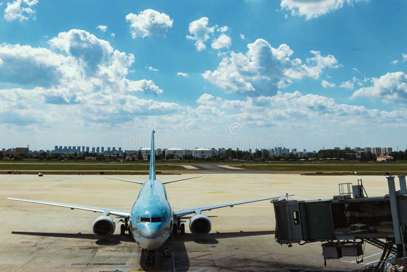 An Civil Airplane in the Airport Editorial Photo - Image of coastal ...