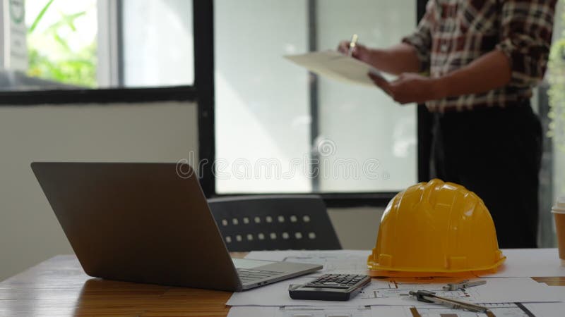 Civil Engineer or Architect Calculator and Working with Blueprint ...