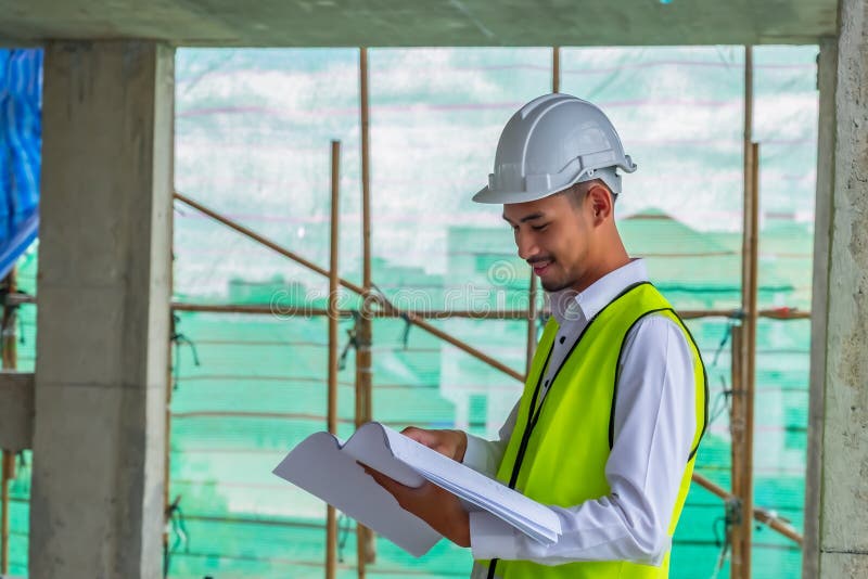 Civil Engineer is Inspecting in Building Site Stock Image - Image of ...