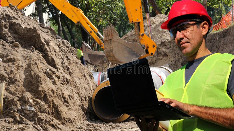 Engineer Using Laptop at an Electrical Substation. Stock Image - Image ...