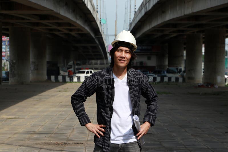 Civil Engineer Man with White Helmet, Standing with Project Drafts in ...