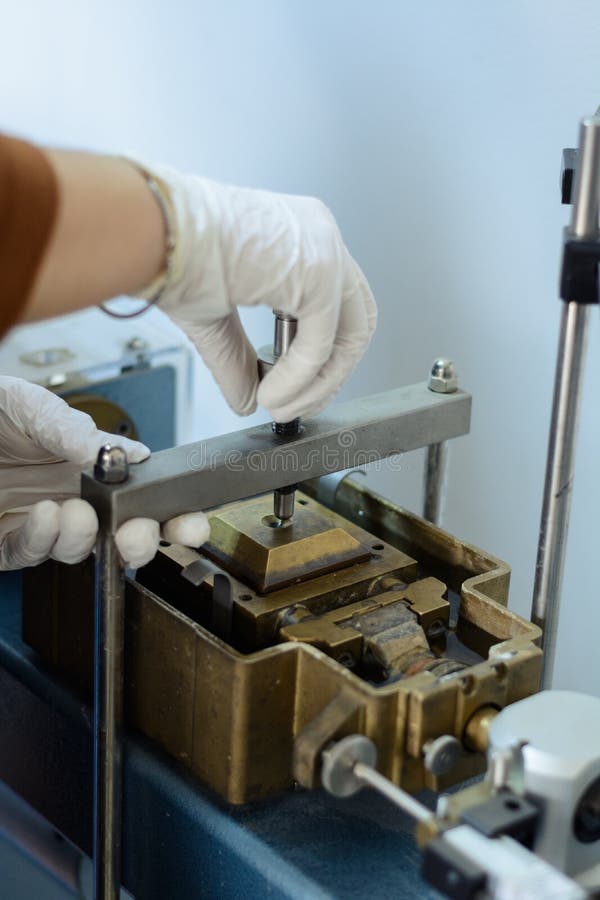 Civil Engineer Mounting a Direct Shear Test Equipment for Soil ...