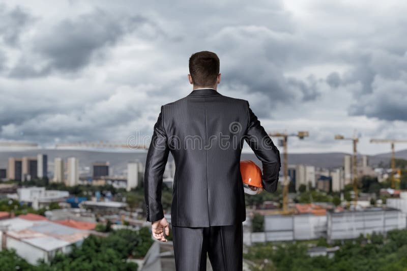 Civil Engineer in a Suit and a Construction Helmet in His Hand Stock ...