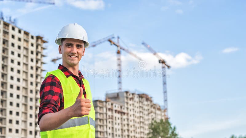 Civil Engineer in a White Helmet on the Background of Construction ...