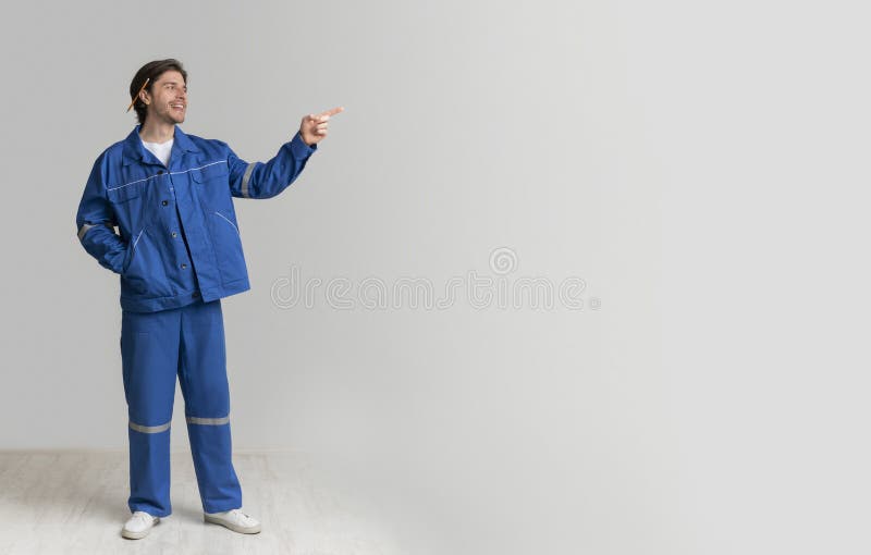 Civil Engineer in Work Uniform Pointing Aside at Copy Space Stock Image ...