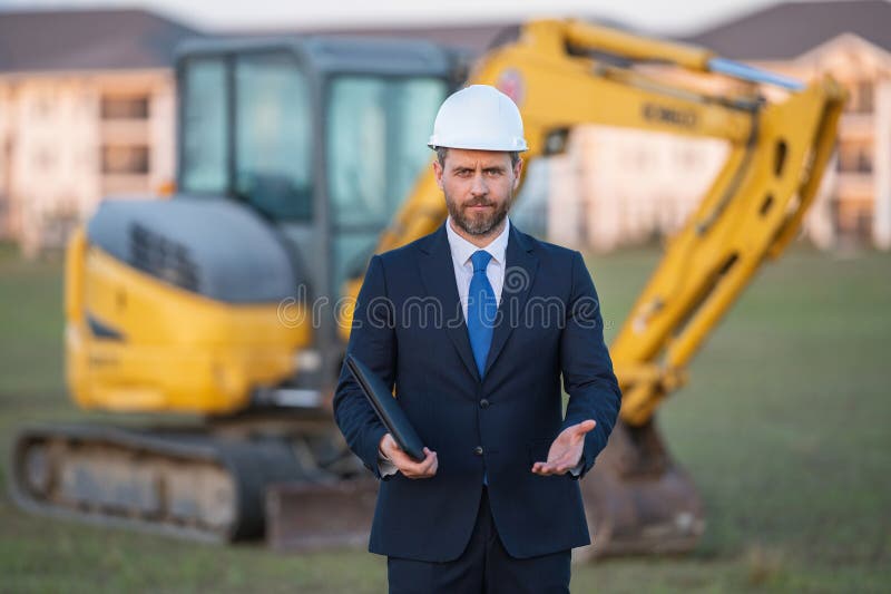 Civil Engineer Worker at a Construction Site. Engineer Man in Front of ...