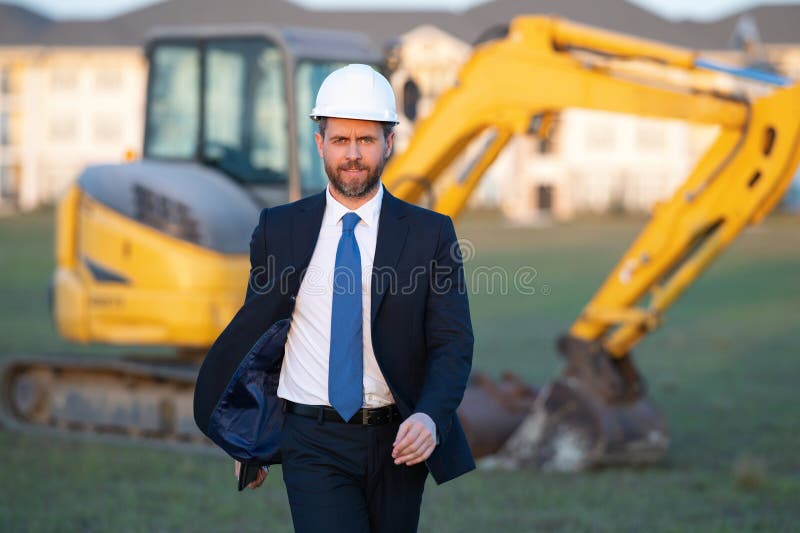 Civil Engineer Worker at a Construction Site. Engineer Man in Front of ...