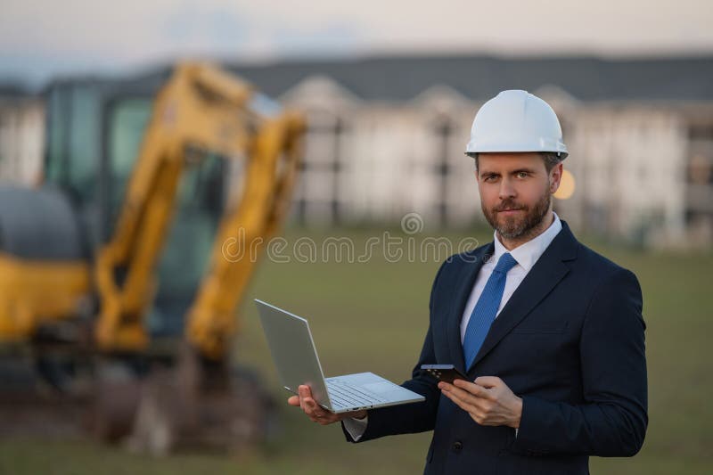 Civil Engineer Worker at a Construction Site. Engineer Man in Front of ...